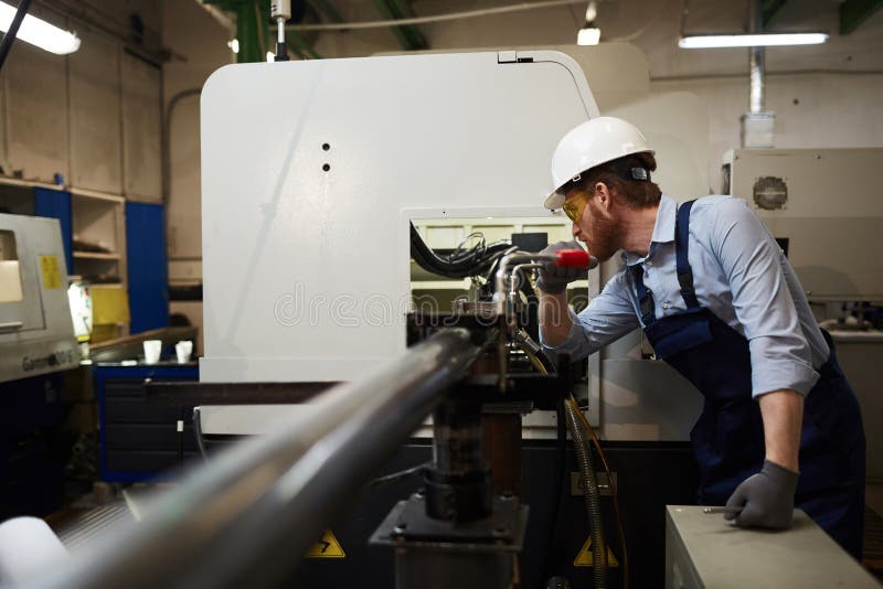 Operator working on lathe stock image. Image of adult - 161873643