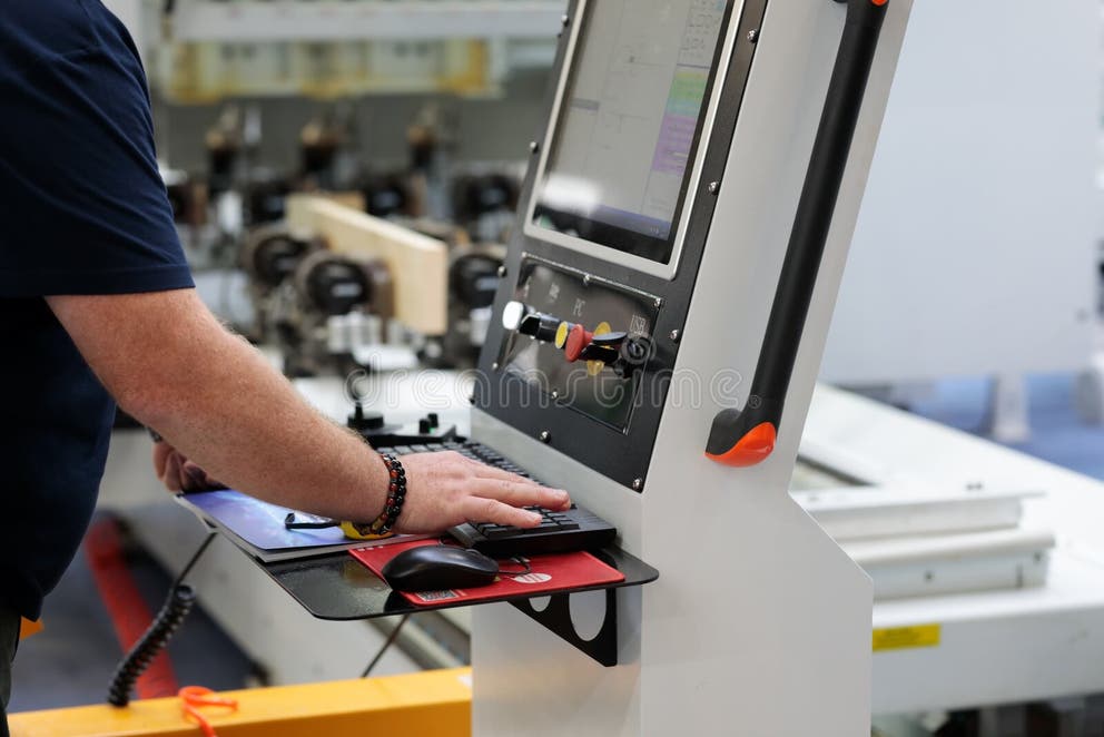 Operator Works at Control Panel of CAD CAM Machine Stock Photo - Image ...