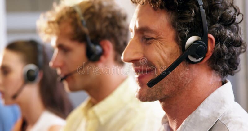 Operators Talking on the Headphone Stock Video - Video of executives ...