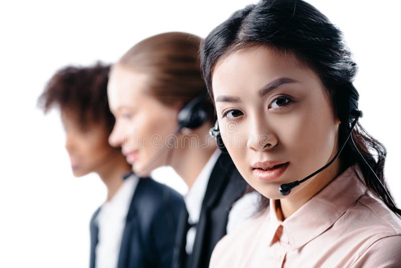 Multiethnic Female Operators Working with Headset Stock Photo - Image ...