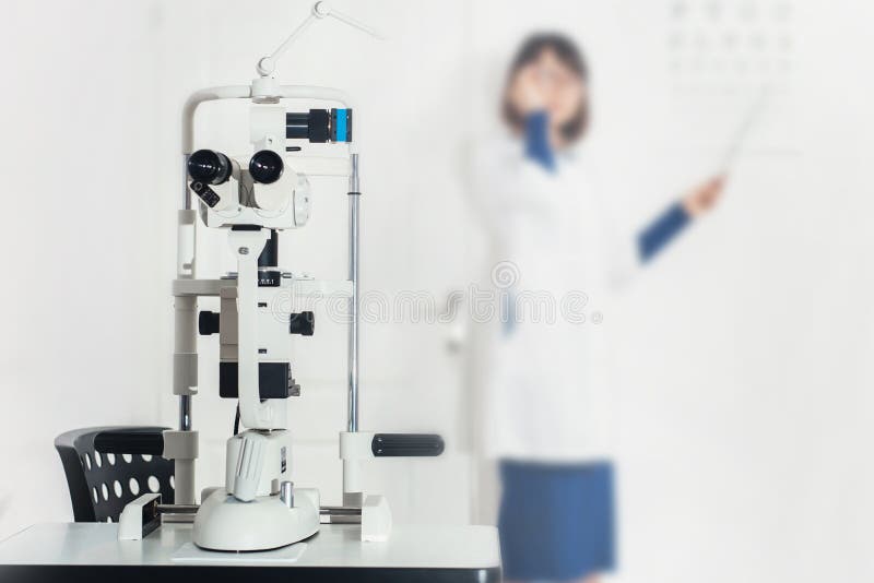 Ophthalmic Device for Vision Testing. Doctor is in Soft Focus. Vision ...