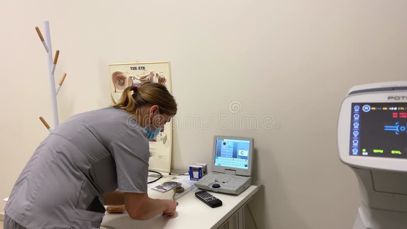 Ophthalmologist Checks the Eyesight Using Modern Vision Tester Close Up ...