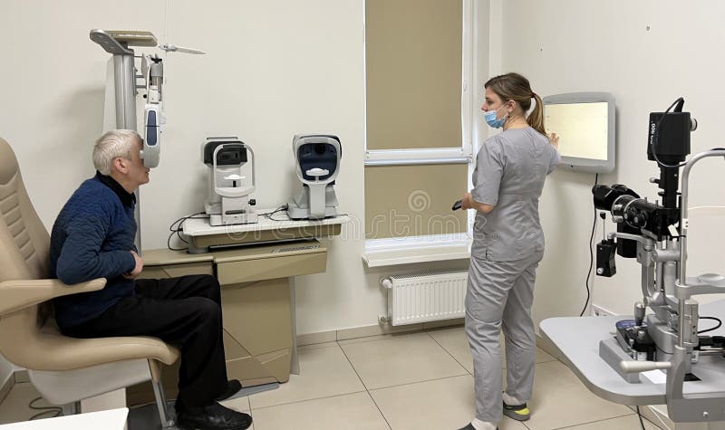 Ophthalmologist Checks the Eyesight Using Modern Vision Tester Close Up ...