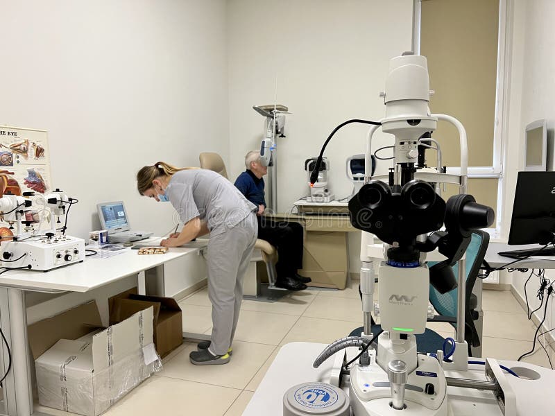 Ophthalmologist Checks the Eyesight Using Modern Vision Tester Close Up ...