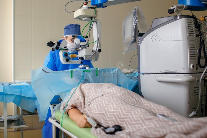 The Ophthalmologist Performs Operations in the Operating Room, Delicate ...