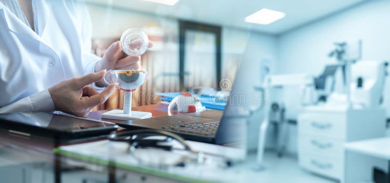 Ophthalmologist Shows Lens Eye Office Stock Photos - Free & Royalty ...