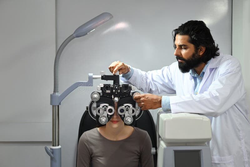Ophthalmologist Testing Vision or Sight of Patient with Optical ...