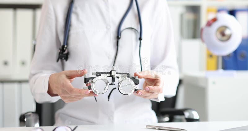 Ophthalmologist with Trial Frame for Selection of Complex Astigmatic ...