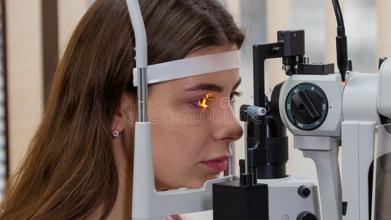 Ophthalmology Treatment - a Young Woman Checking Her Visual Acuity with ...