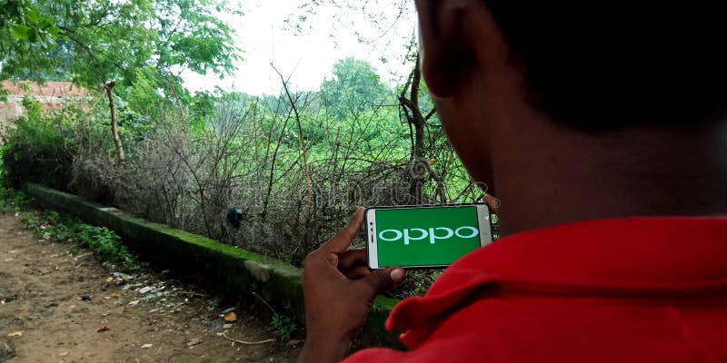 Oppo Mobile Phone Logo Displayed on Smart Phone Screen at Village Area ...