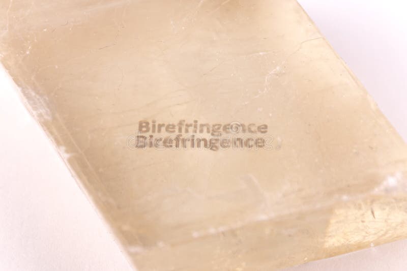 Optical Birefringence Demonstrated Using a Text Using a Natural Double ...