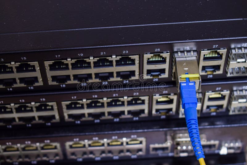 The Optical Cable is Connected To the Switch Module. Many Empty Switch ...