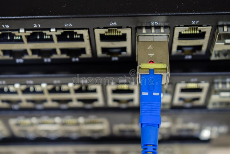 The Optical Cable is Connected To the Switch Module. Many Empty Switch ...