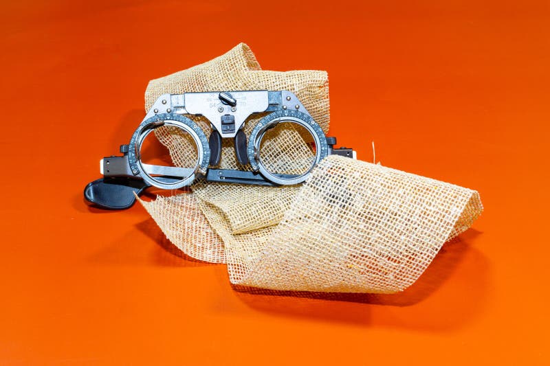Optical Device for Vision Testing on a Brown Cloth with a Orange ...