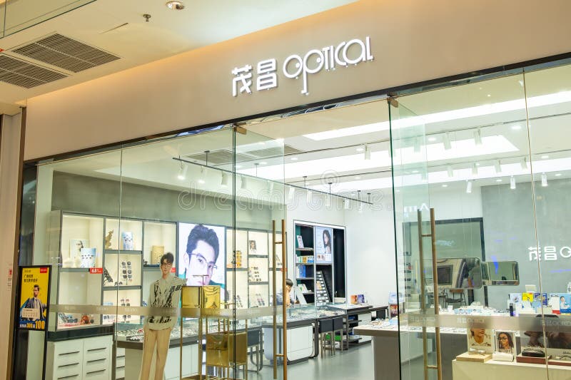 Optical Retail Shop in a Shopping Mall Editorial Stock Image - Image of ...