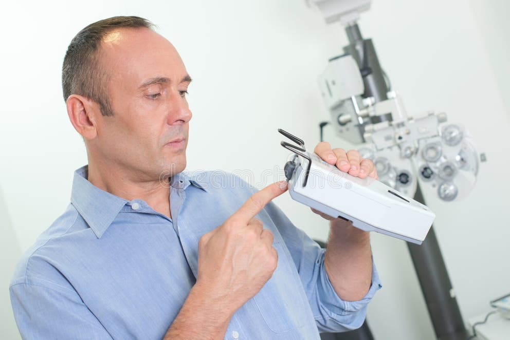 Optician Checking Equipment Stock Image - Image of apparatus, examine ...