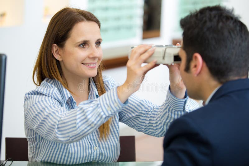 Optician Measuring Pupil Center Client Stock Photo - Image of pressure ...