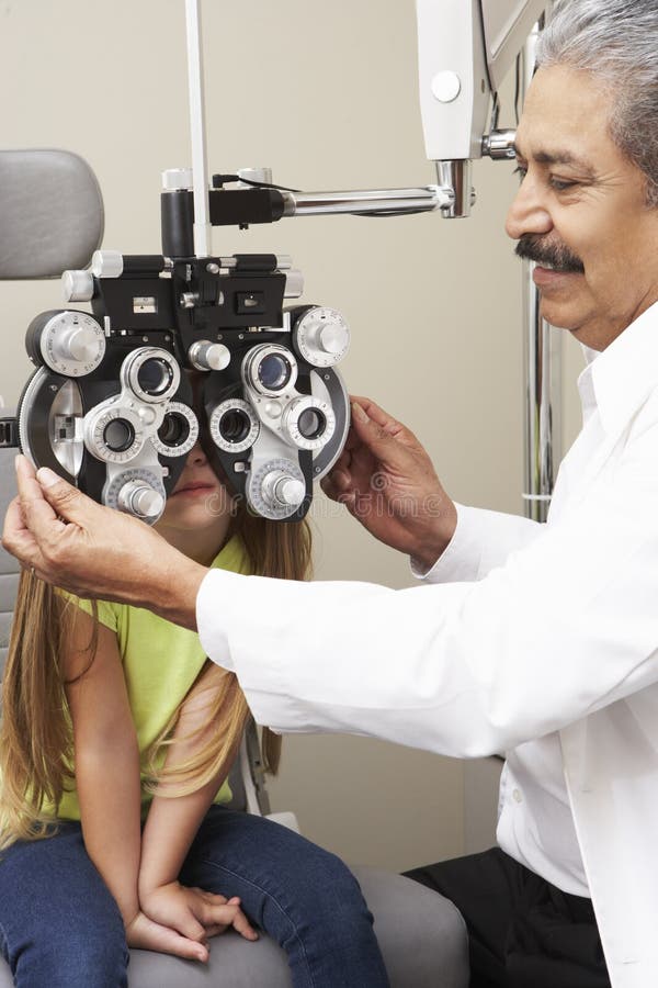 Optician in Surgery Giving Woman Eye Test Stock Image - Image of lens ...