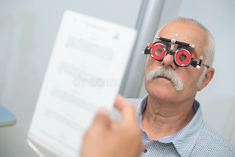 Optician in Surgery Giving Man Eye Test Stock Image - Image of eyesight ...