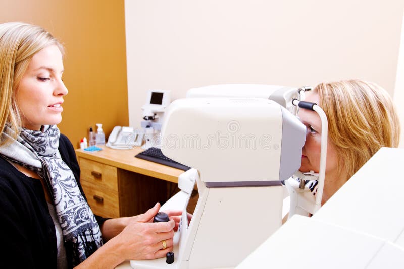 Optician Testing Eye Pressure on Client Stock Image - Image of fluid ...