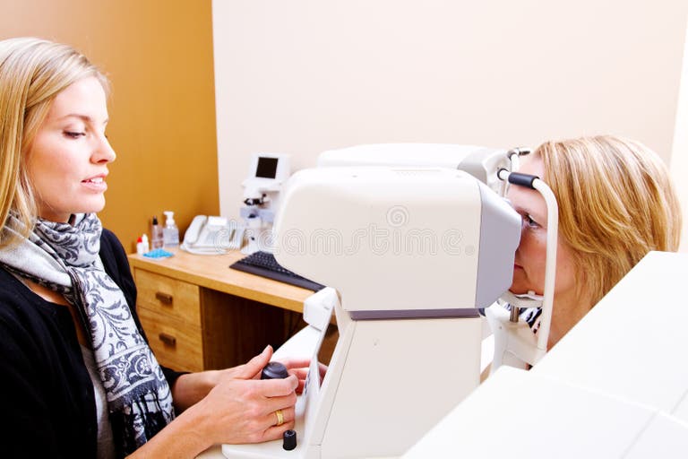 Optician Testing Eye Pressure on Client Stock Image - Image of fluid ...