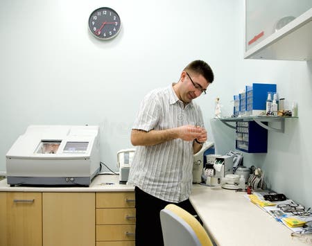 Optician at work. stock photo. Image of health, medical - 2310328