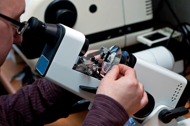 Optician in the Work,repair of Glasses Stock Image - Image of grinder ...