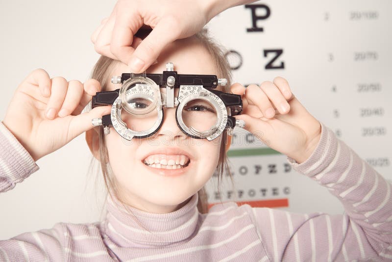 Otoscope and eyechart stock image. Image of instrument - 6796251