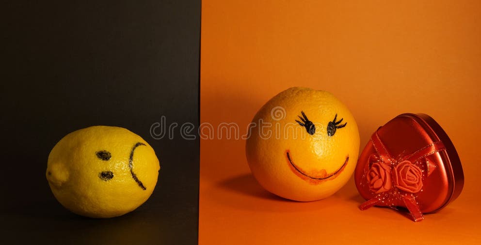 Optimism and Pessimism Concept. Lemon with a Sad Smiley Face and Orange ...