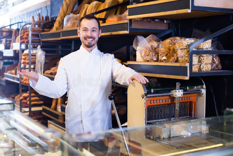 Optimistic Male Pastry Maker Demonstrating Pastry Stock Photo - Image ...