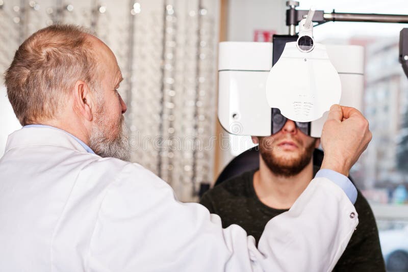 Optometric exam stock image. Image of clinic, lens, correction - 127368481