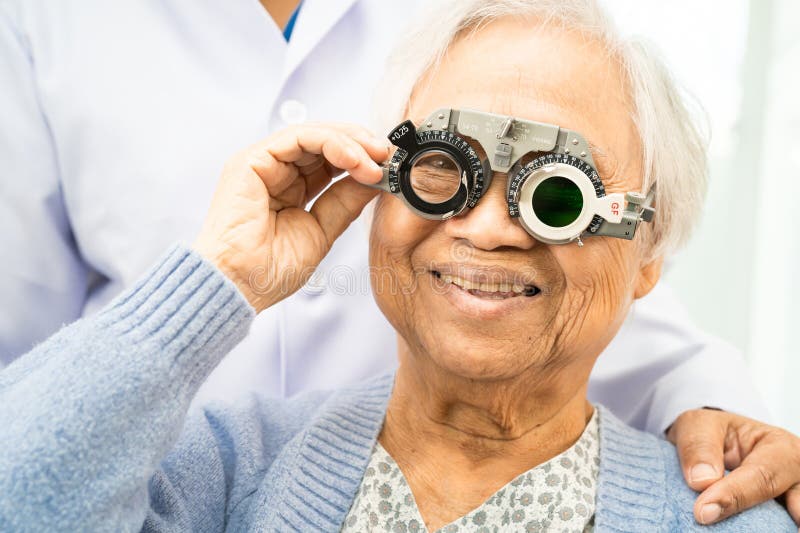 Optometrist Checking Asian Elderly Woman Ophthalmic Vision Eye Test and ...