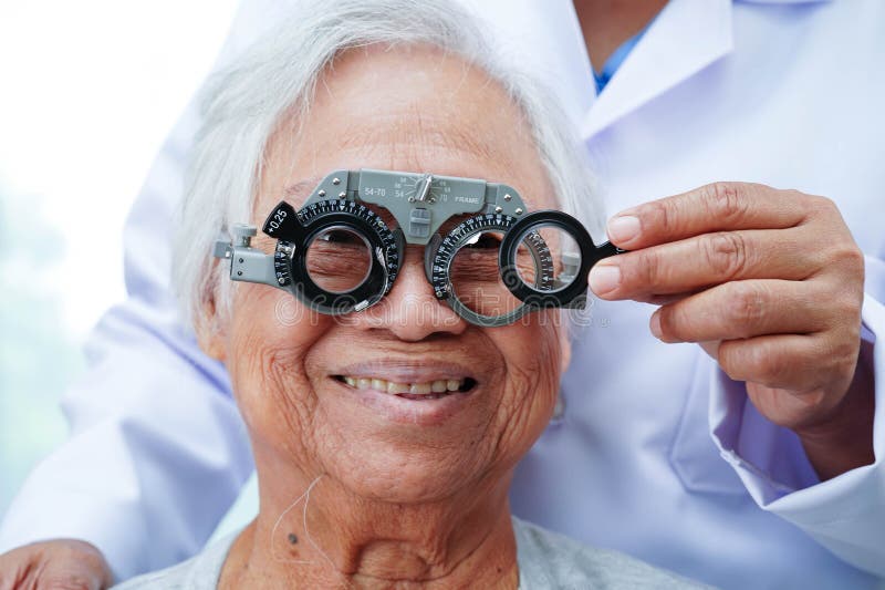 Optometrist Checking Asian Elderly Woman Ophthalmic Vision Eye Test and ...