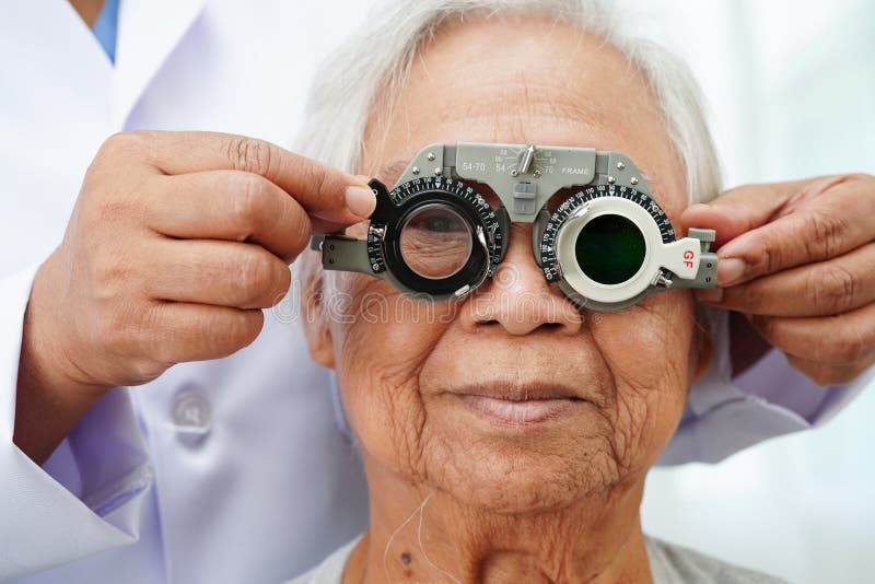 Optometrist Checking Asian Elderly Woman Ophthalmic Vision Eye Test and ...