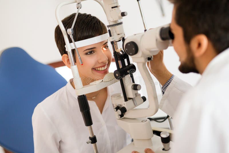 Optometrist Checking Patient Eyesight and Vision Correction Stock Image ...