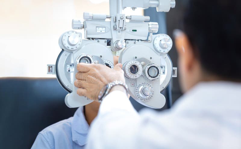 Optometrist Doing Sight Testing for Child Patient in Clinic, Kid Boy ...