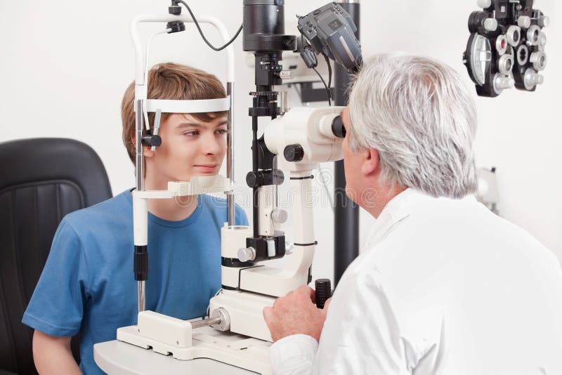 Optometrist Doing Sight Testing Stock Image - Image of eyeglasses ...
