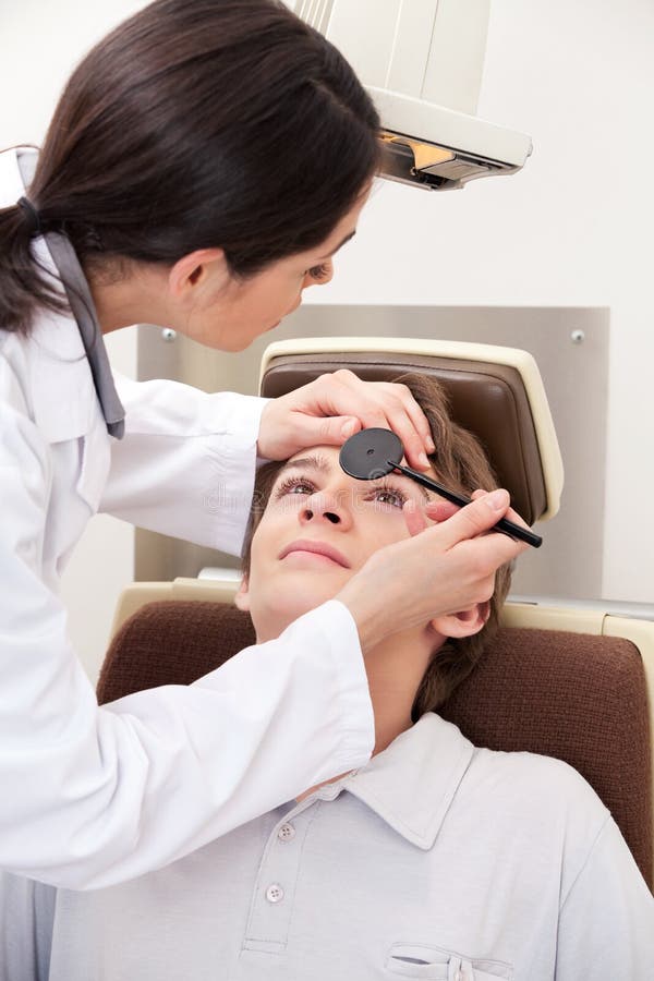 Optometrist Doing Sight Testing Stock Image - Image of examination ...