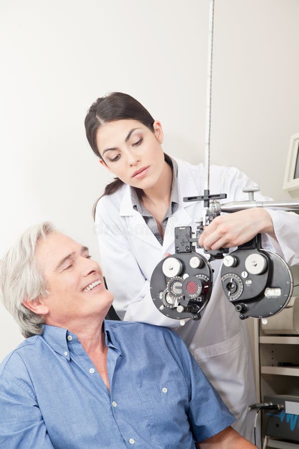 Optometrist Doing Sight Testing Stock Photo - Image of ophthalmologic ...