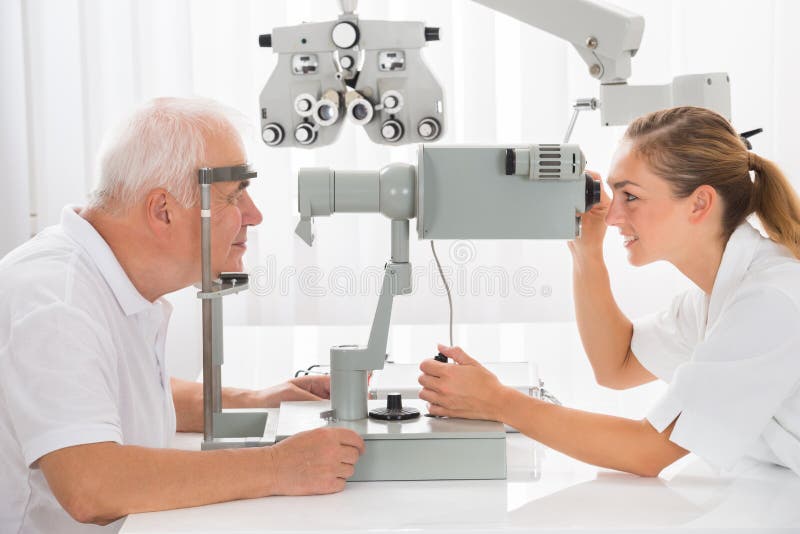 An Optometrist Doing Vision Testing for Male Patient Stock Image ...