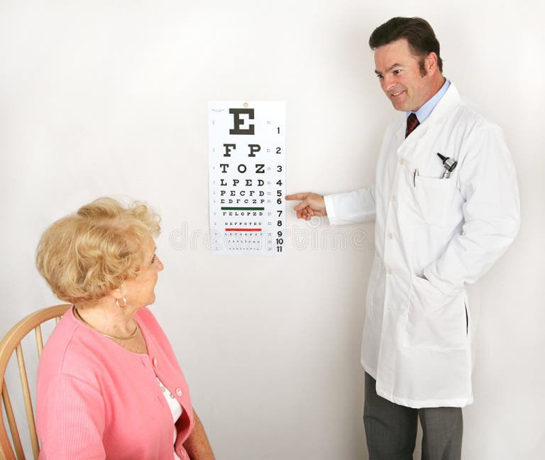 Optometrist Showing Eye Chart Stock Photo - Image of office, people ...