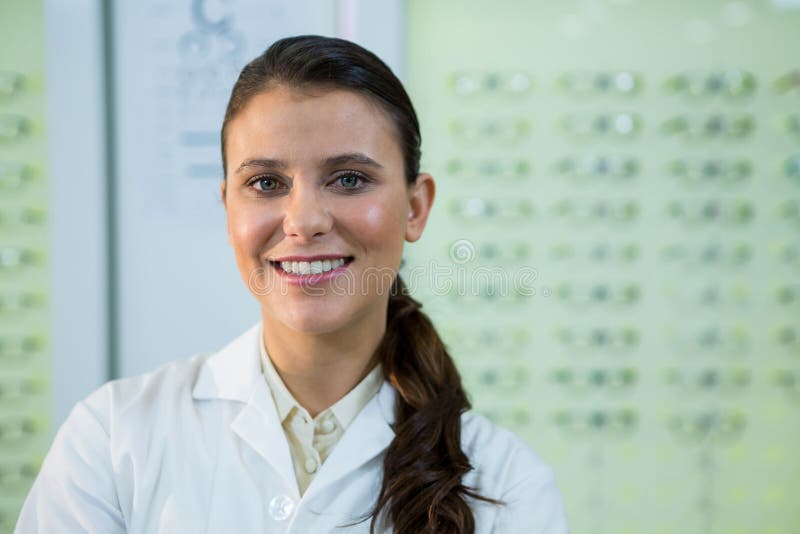 Optometrist Smiling in Optical Store Stock Image - Image of laboratory ...