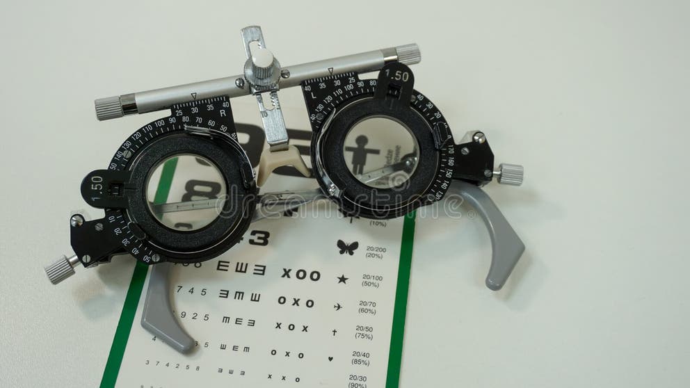 Optometrist Trial Frame with with Corrective Lenses on Eye Chart Stock ...