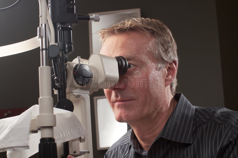 Optometrist Using Bio Microscope Stock Image - Image of vision, people ...
