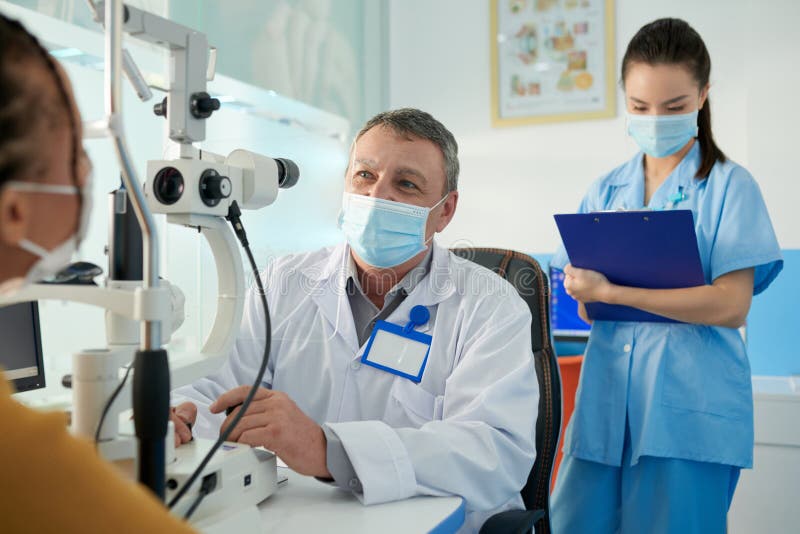 Optometrist Using Modern Equipment Stock Image - Image of disease ...