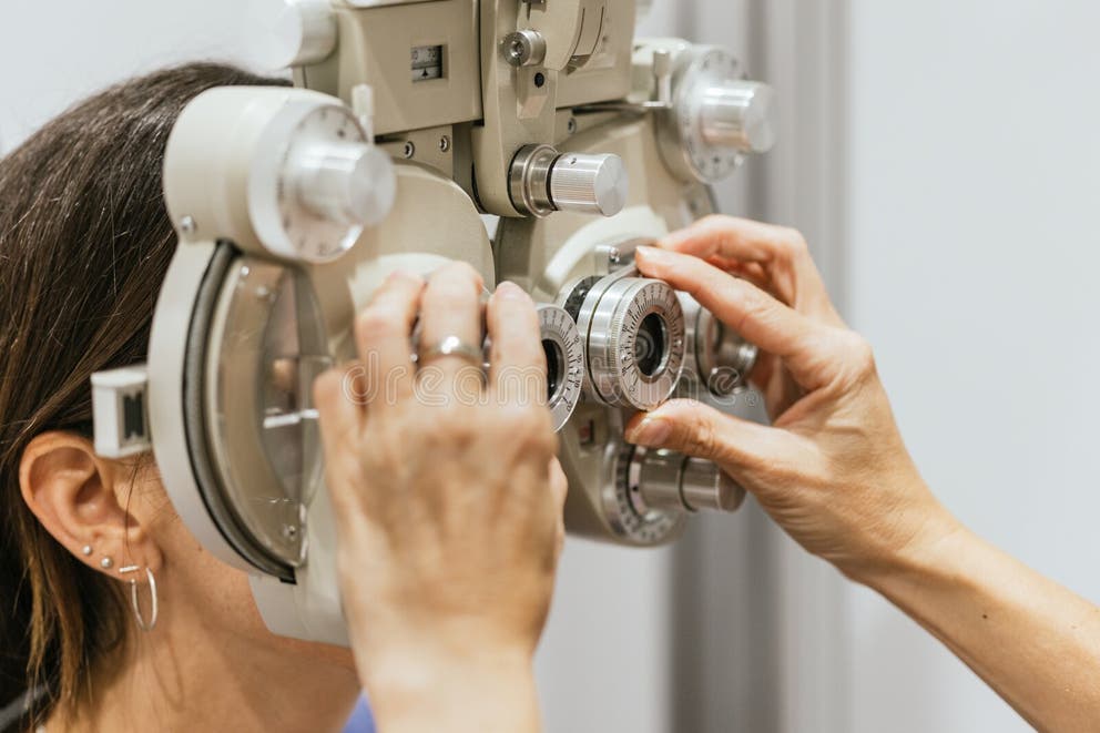 Optometrist Using Phoropter for Eyesight Testing Stock Photo - Image of ...