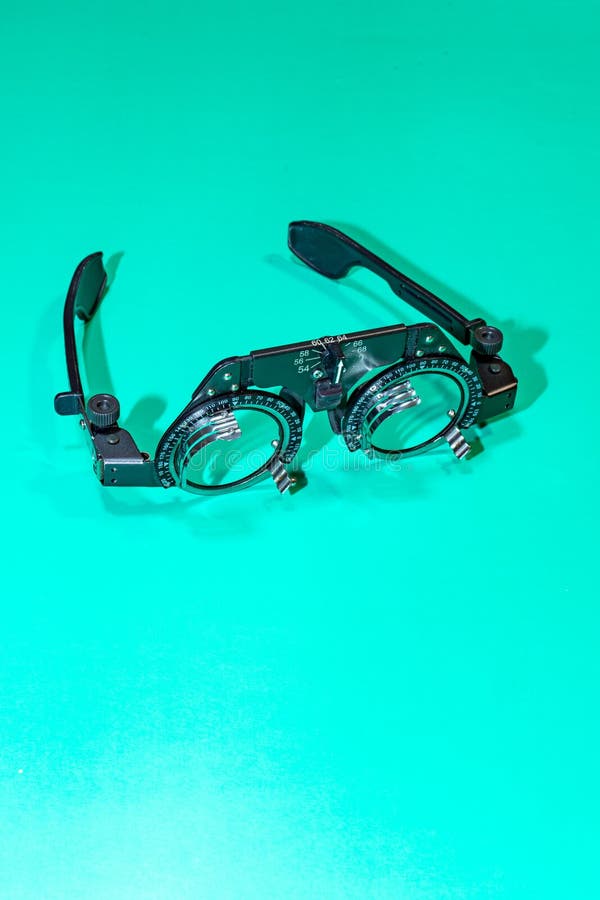 Optometry Optics Test Glasses on a Green Table. Stock Photo - Image of ...