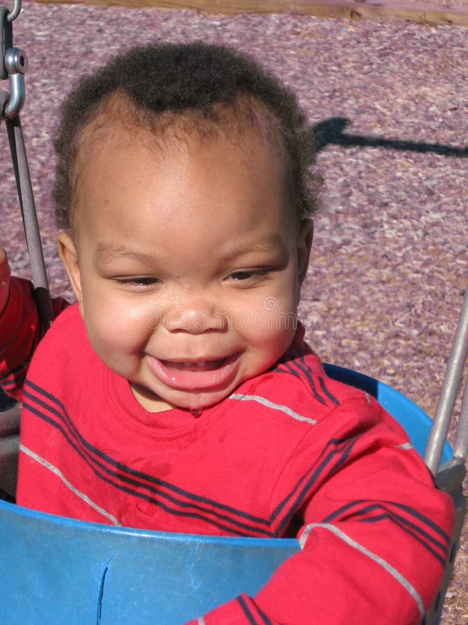 Opvang stock foto. Image of gelukkig, jamaicaans, baby - 1512000