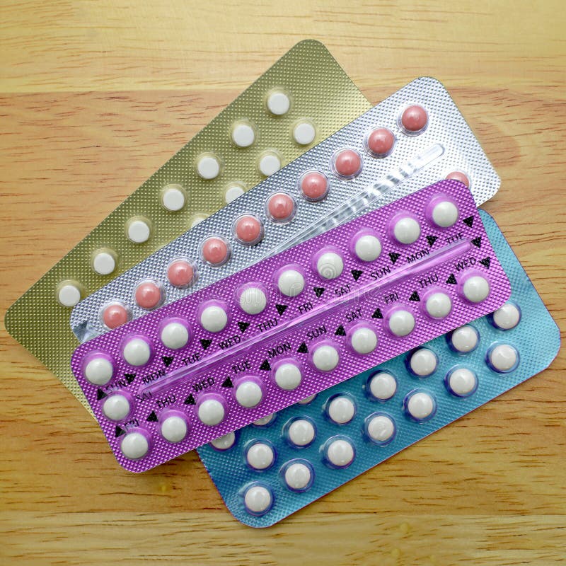 Oral Contraceptive Pill Strips on Pine Wood Table. Stock Image - Image ...