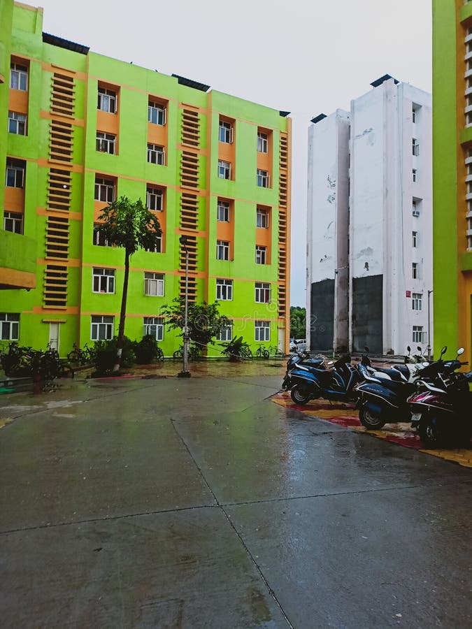 Orange Abd Green Building with Clouds and and Some Waterfall Editorial ...